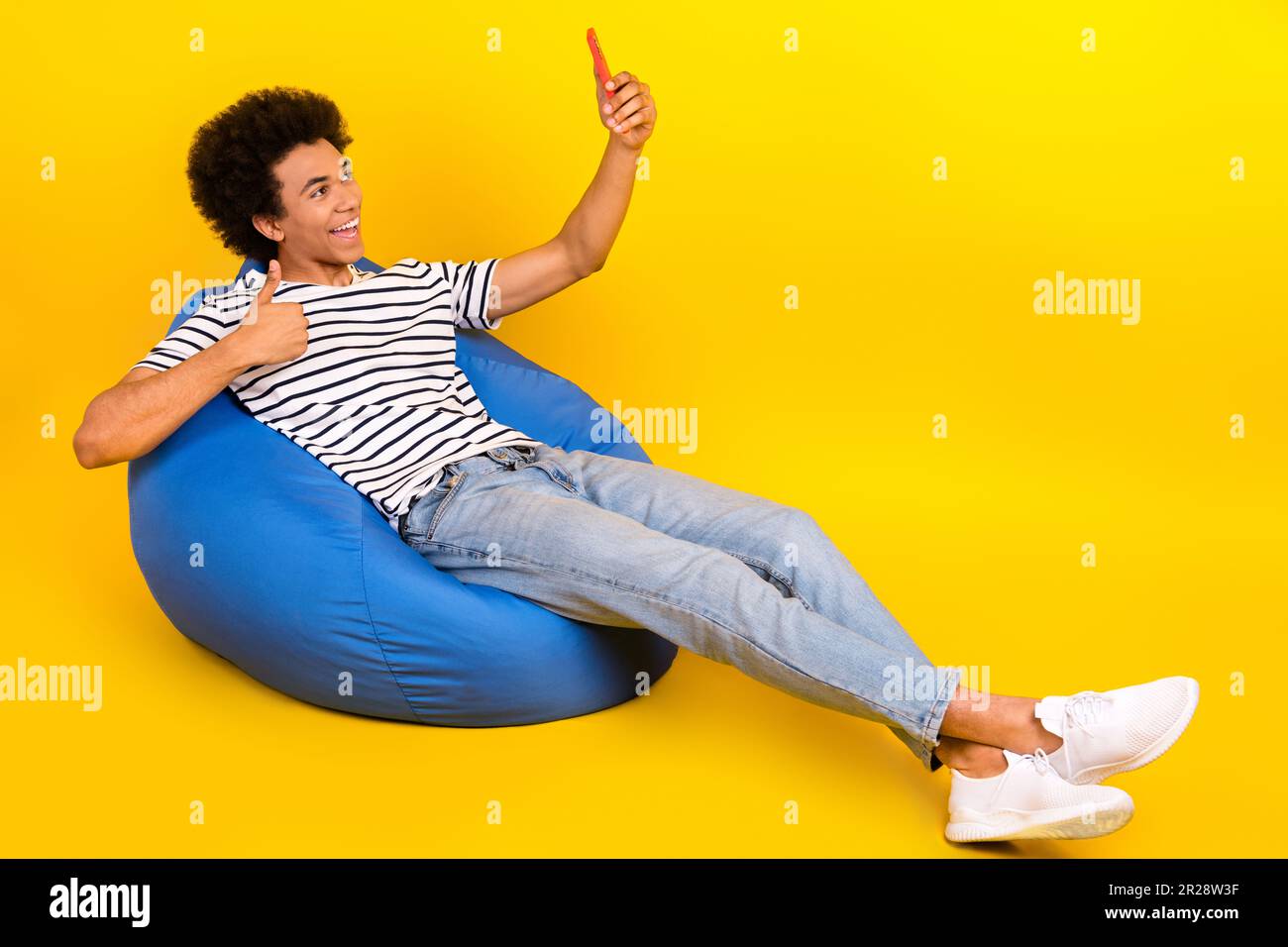 Full length photo of lying pouf young blogger man thumb up paid advert ...
