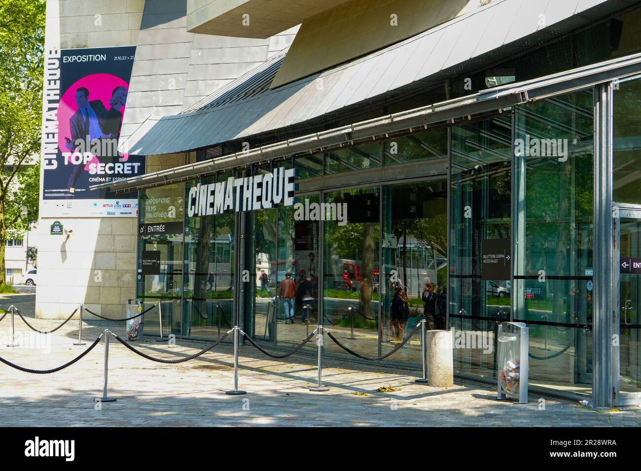 People outside the entrance to the Cinematheque, the French film museum ...