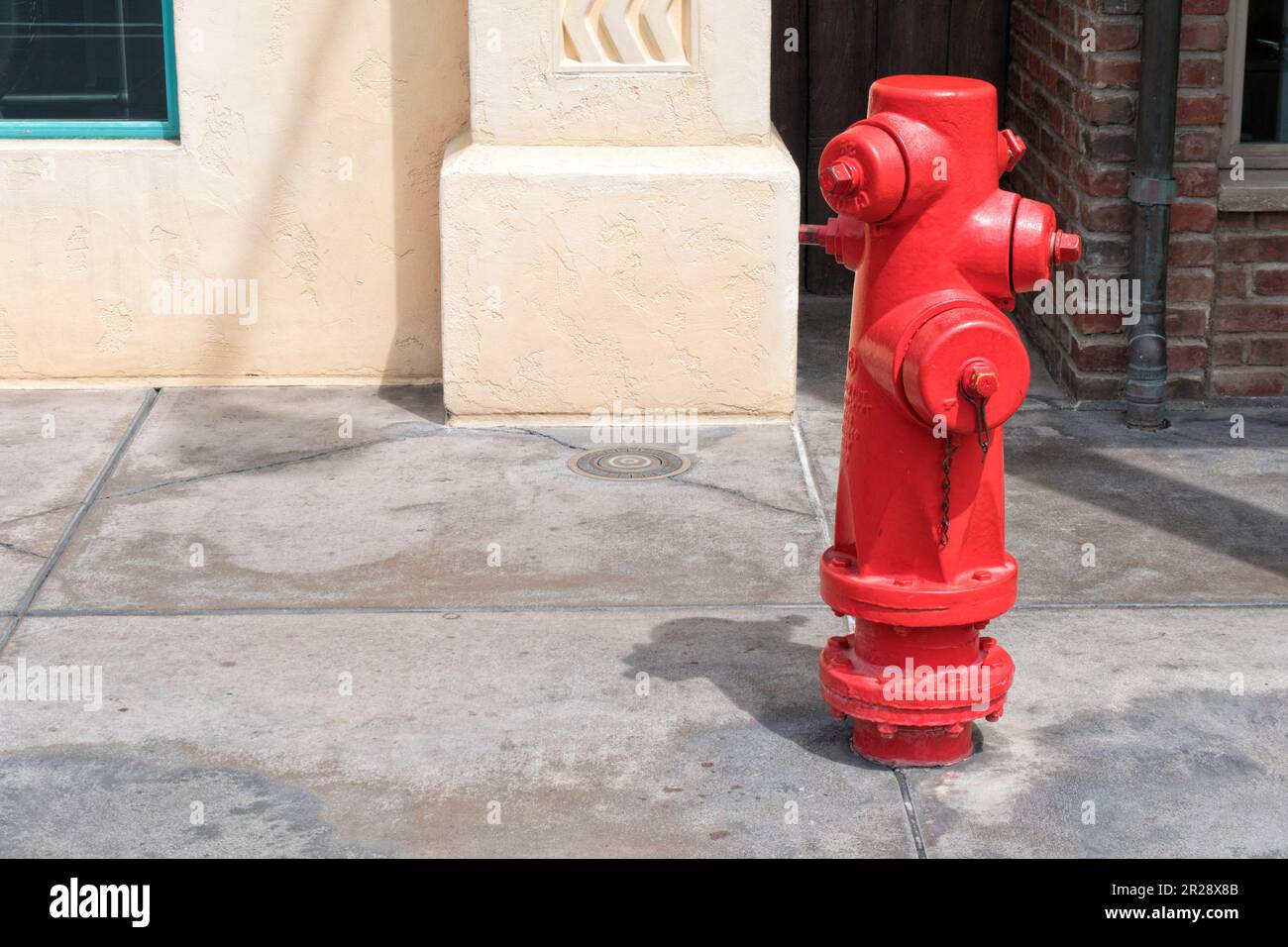 Red fire hydrant on sidewalk Stock Photo - Alamy
