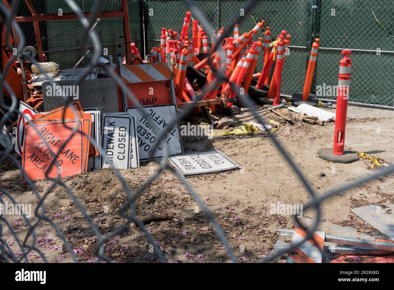 Road construction site with signs and traffic road bollards through ...