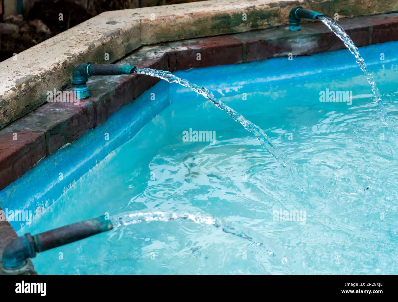 Drinking fountain water flowing from hi-res stock photography and ...