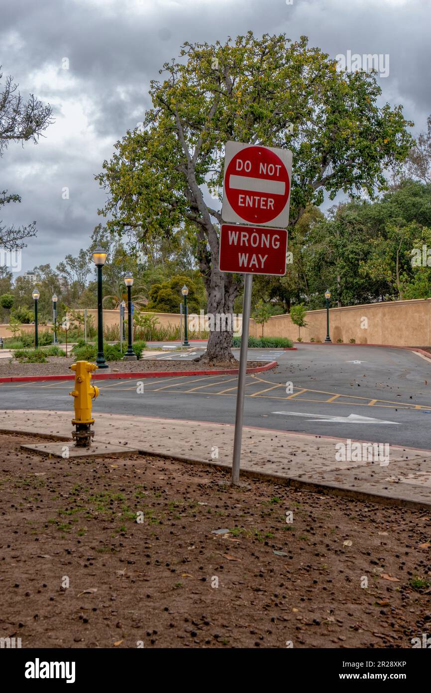 Do Not Enter and Wrong Way signs in the park Stock Photo - Alamy