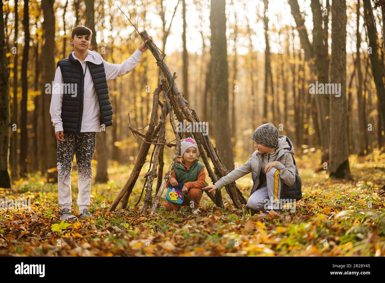 Children playing sticks outdoors hi-res stock photography and images ...