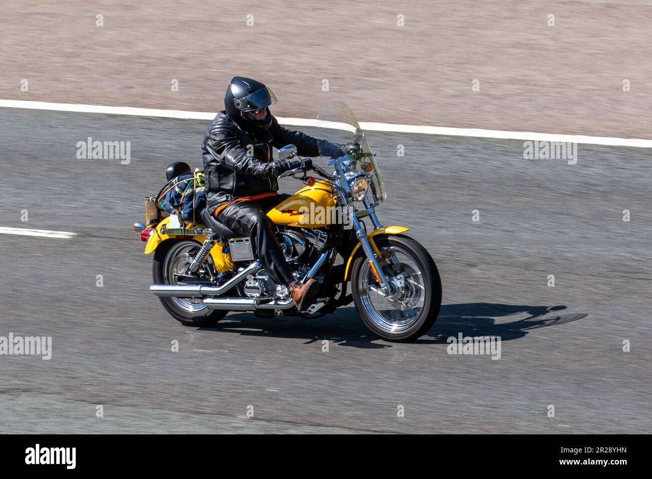 2001 Yellow Harley-Davidson Low Rider, Low Rider FXDL; travelling on ...