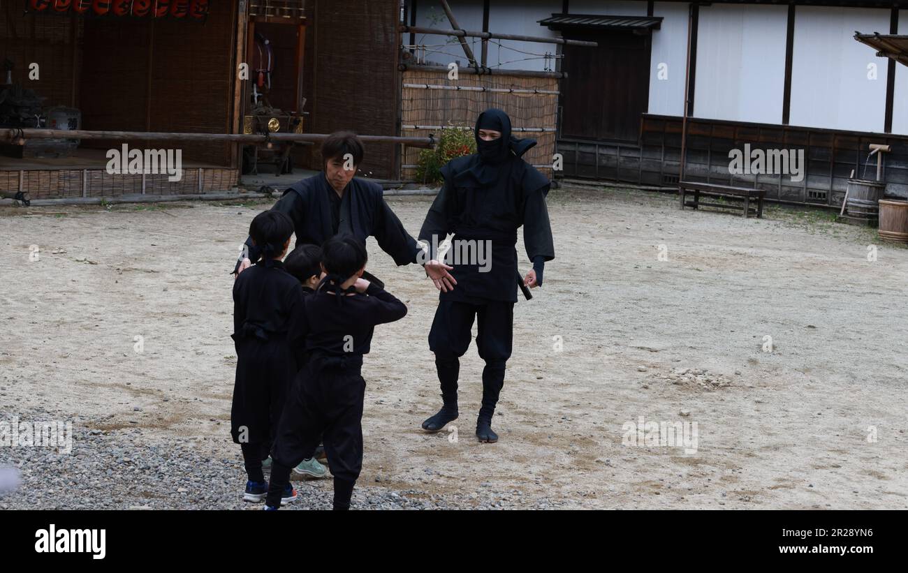 unidentified artist dress like Ninja in the parade of theme park in ...