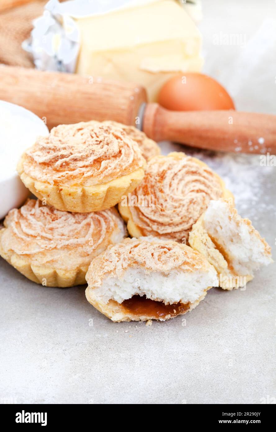 traditional South African Hertzog cookies, coconut and jam tartlets ...
