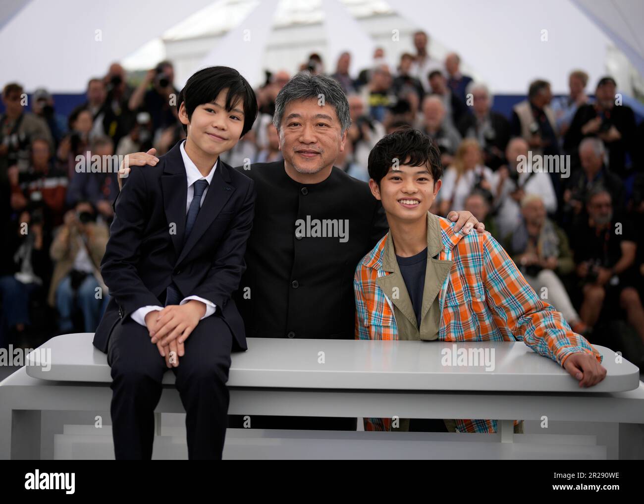 Hinata Hiiragi From Left Director Hirokazu Koreeda And Soya Pose For Photographers At The