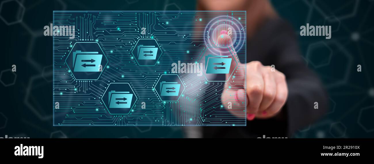 Woman touching a data exchange concept on a touch screen with her ...