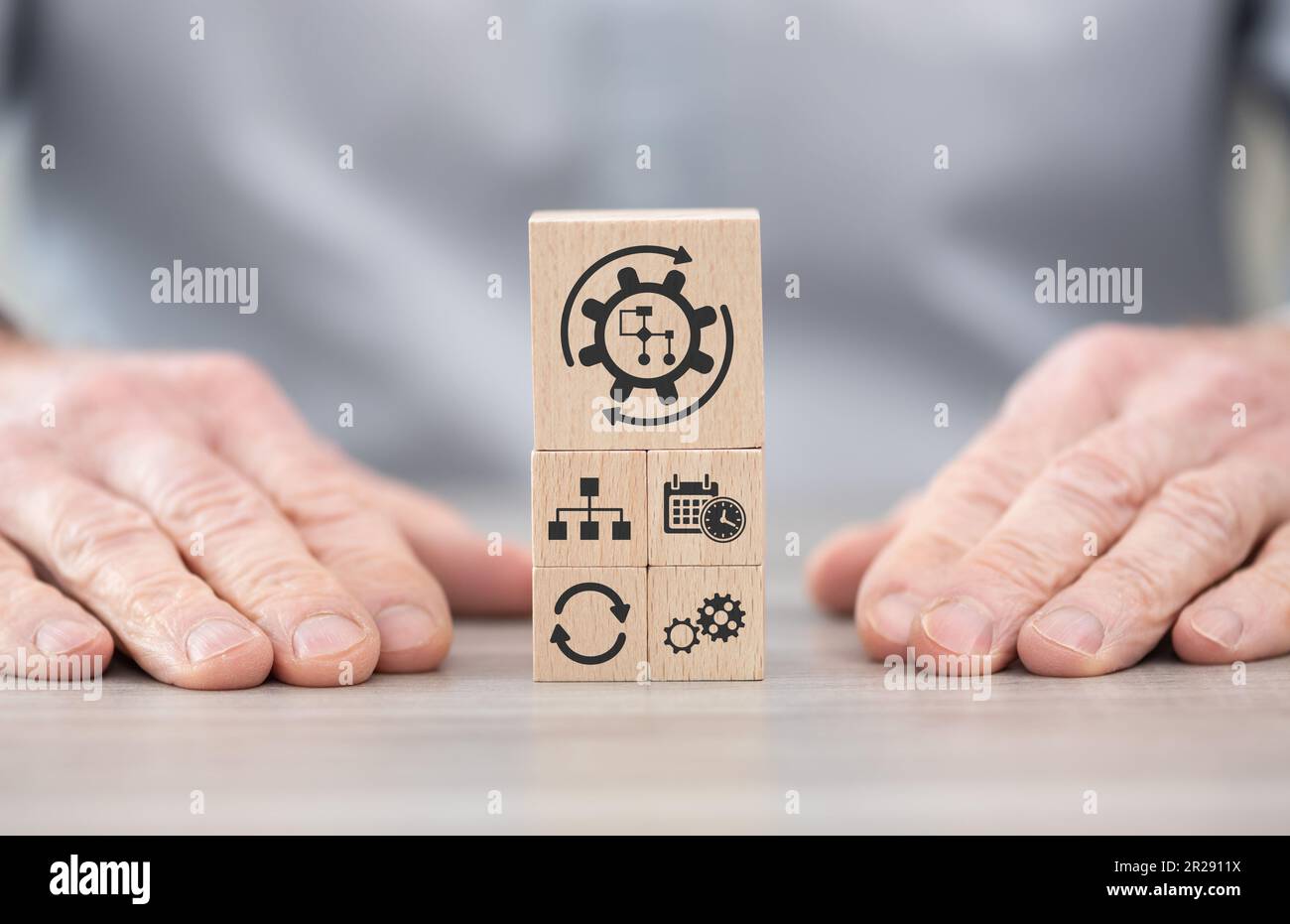 Wooden blocks with symbol of workflow concept Stock Photo - Alamy