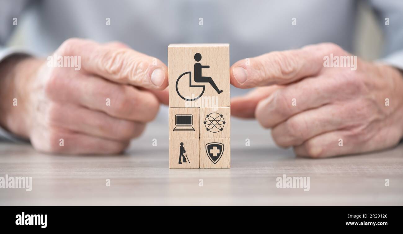 Wooden blocks with symbol of disability concept Stock Photo - Alamy