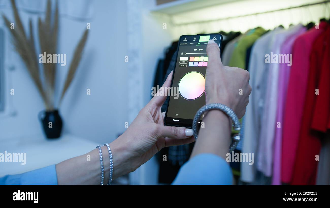 Changing The Color Of Wardrobe's Light Stock Photo - Alamy