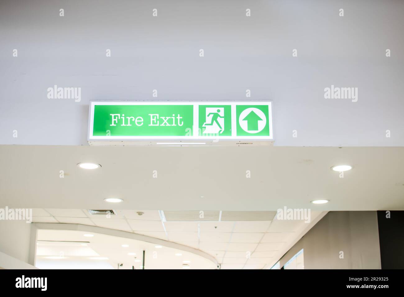 Source text White background fire exit sign White lettering is clearly ...