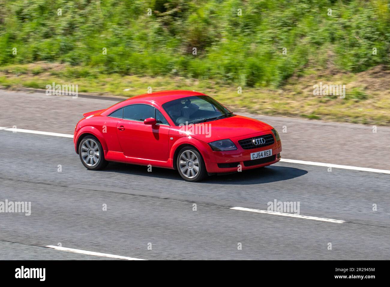 2004 Red AUDI TT T 180BHP 5 speed manual; travelling on the M61 ...