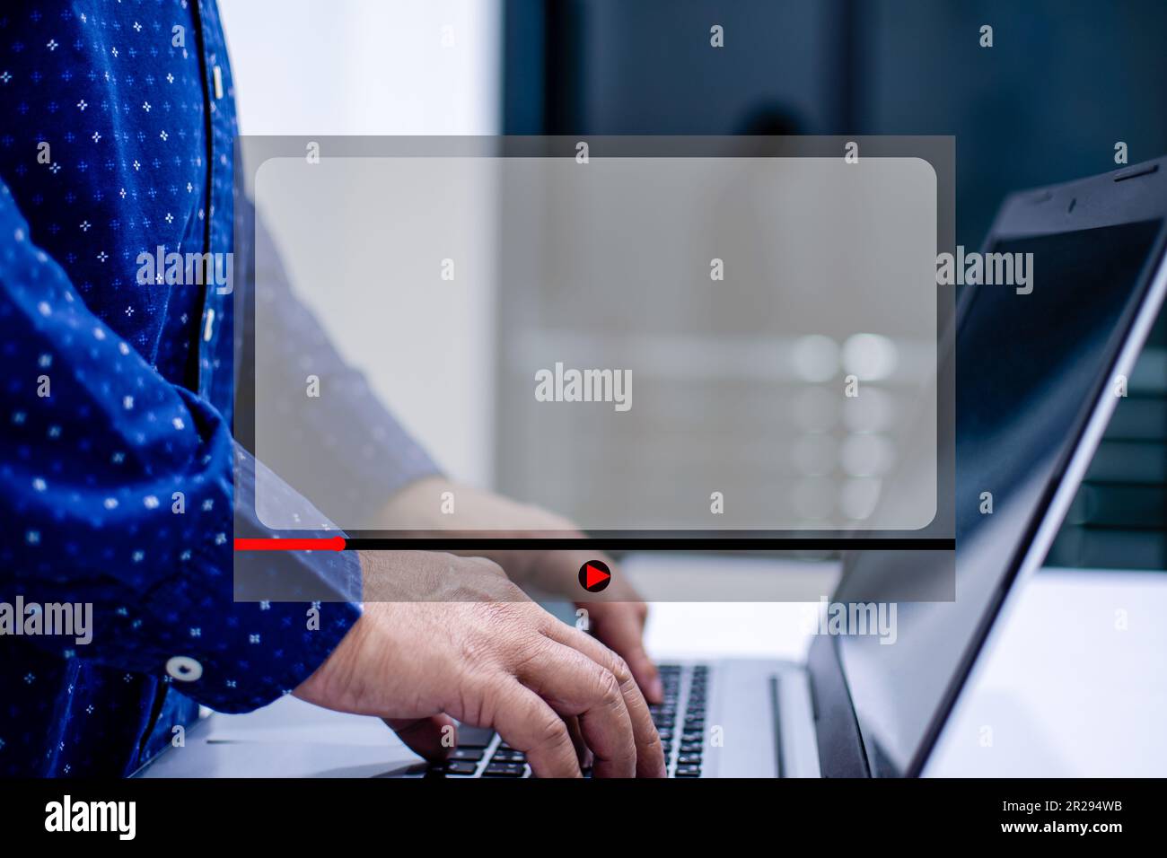 Men standing and typing a look for a movie with a notebook computer on ...