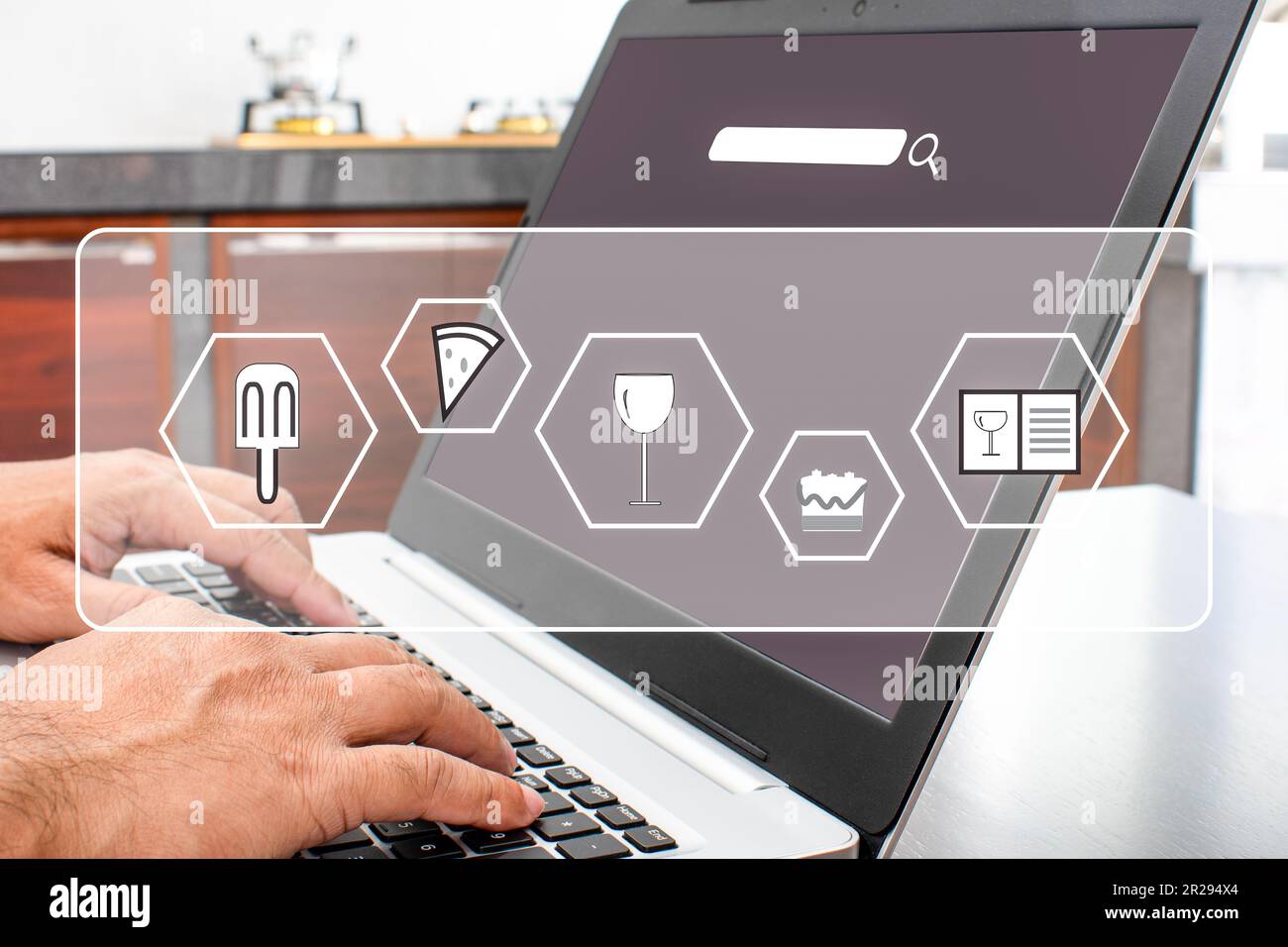 Closeup, A man's hand is typing on a laptop keyboard to search out how ...