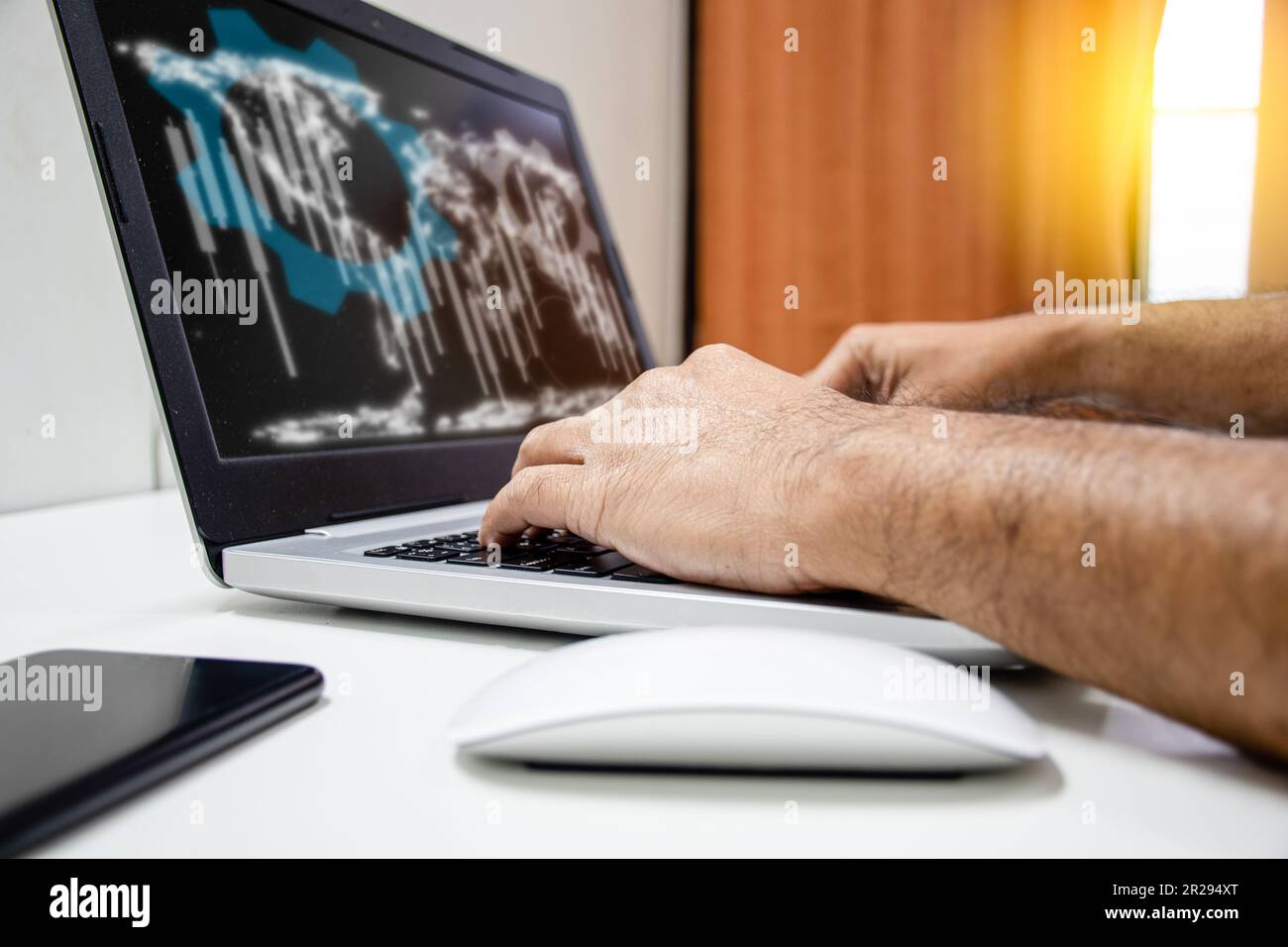 Take a close-up of male hands and laptops with a white world, graph ...