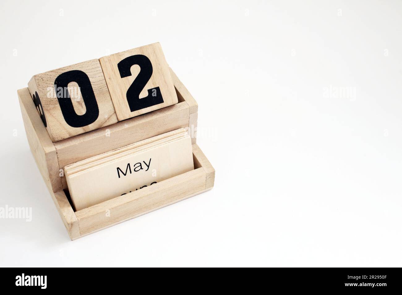 Wooden perpetual calendar showing the 2nd of May Stock Photo - Alamy