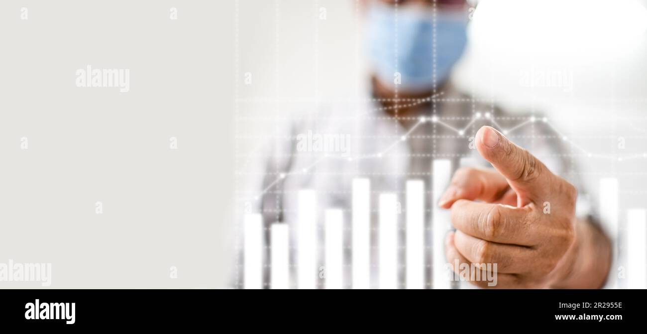 The man's finger points to the graph. Business men's hands are pointing ...