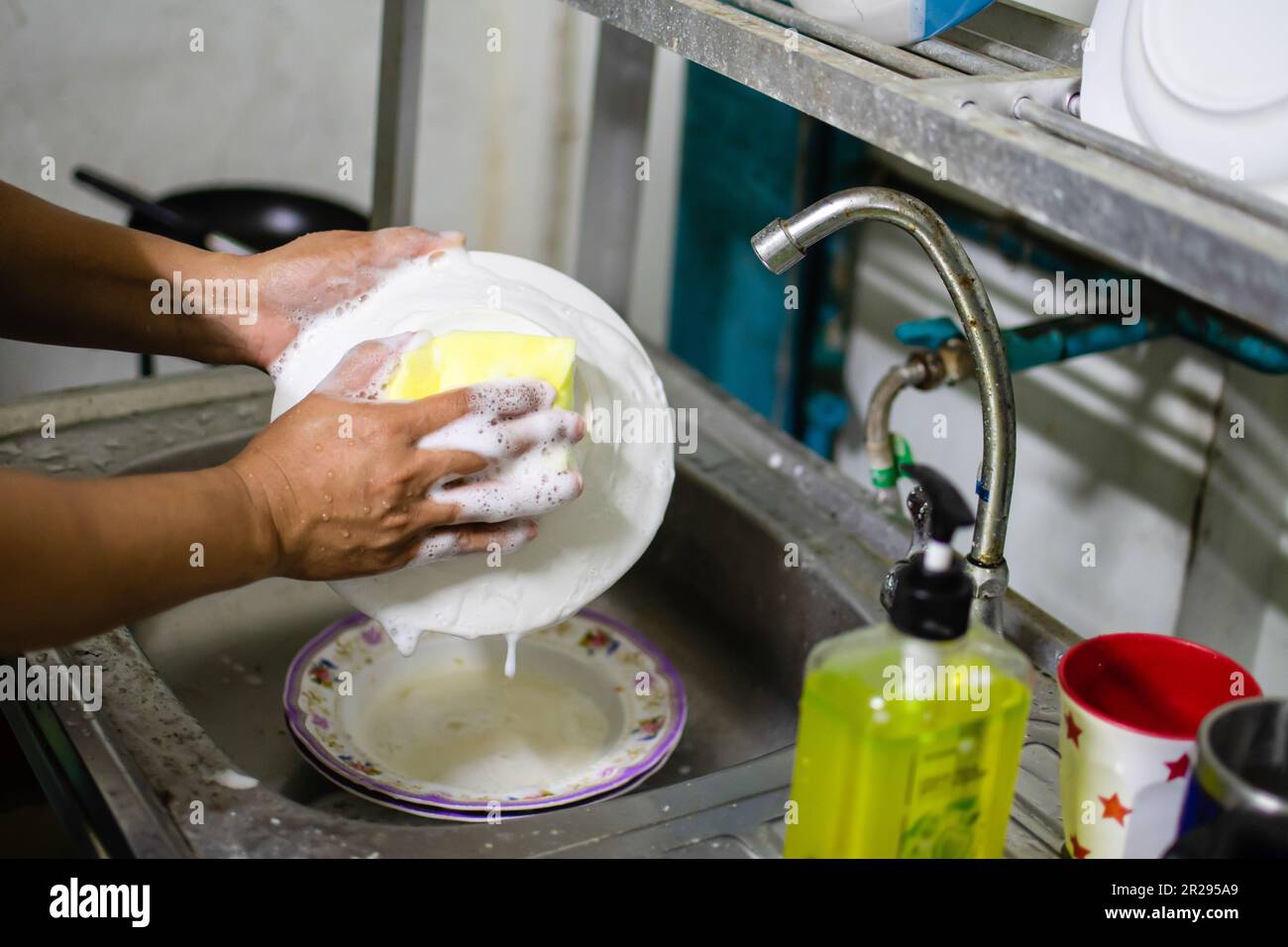 Beautiful women doing the washing hi-res stock photography and images ...