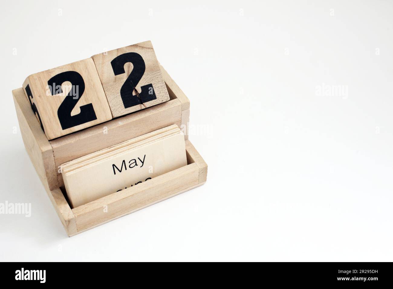 Wooden perpetual calendar showing the 22nd of May Stock Photo - Alamy