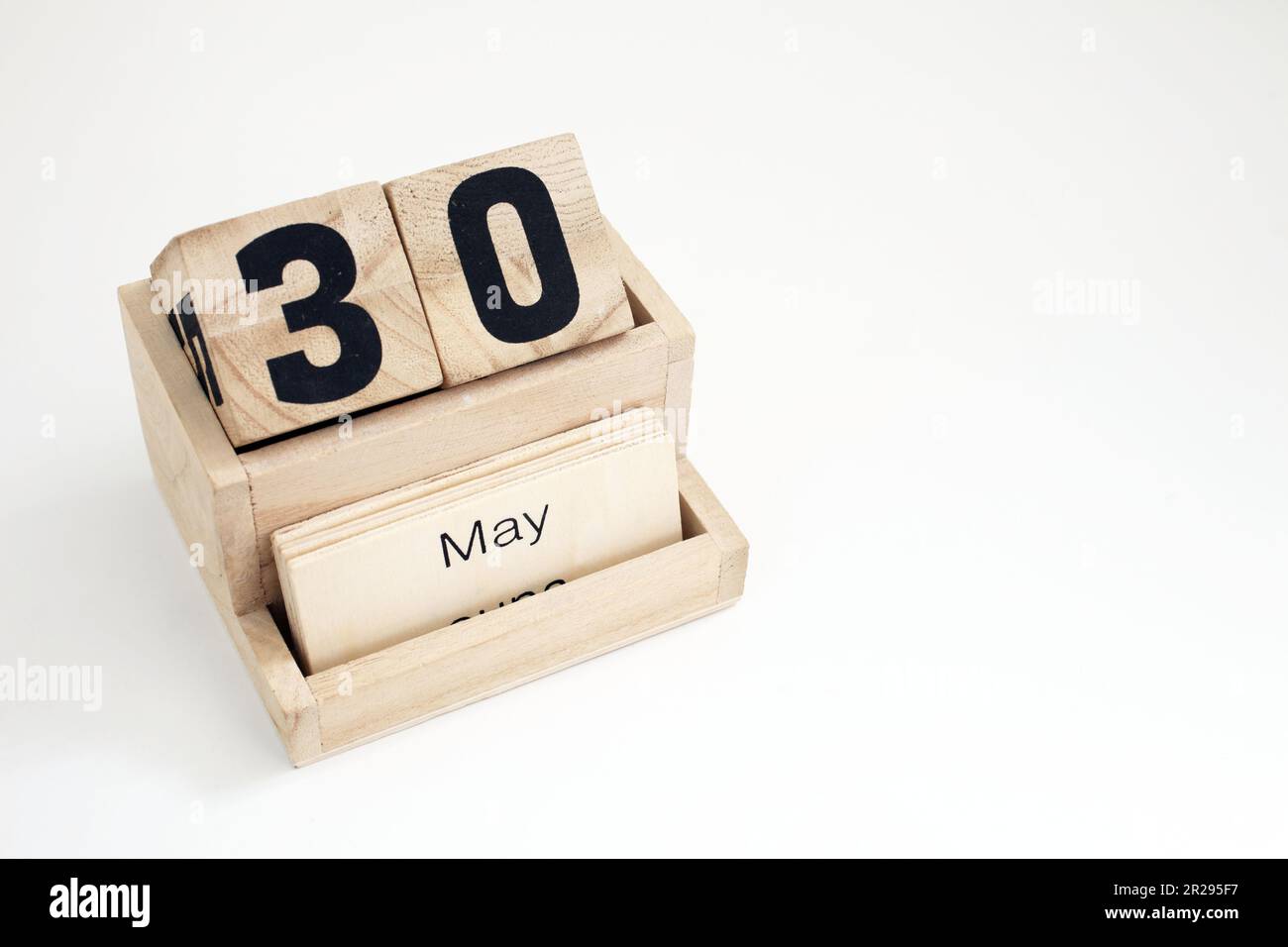 Wooden perpetual calendar showing the 30th of May Stock Photo - Alamy