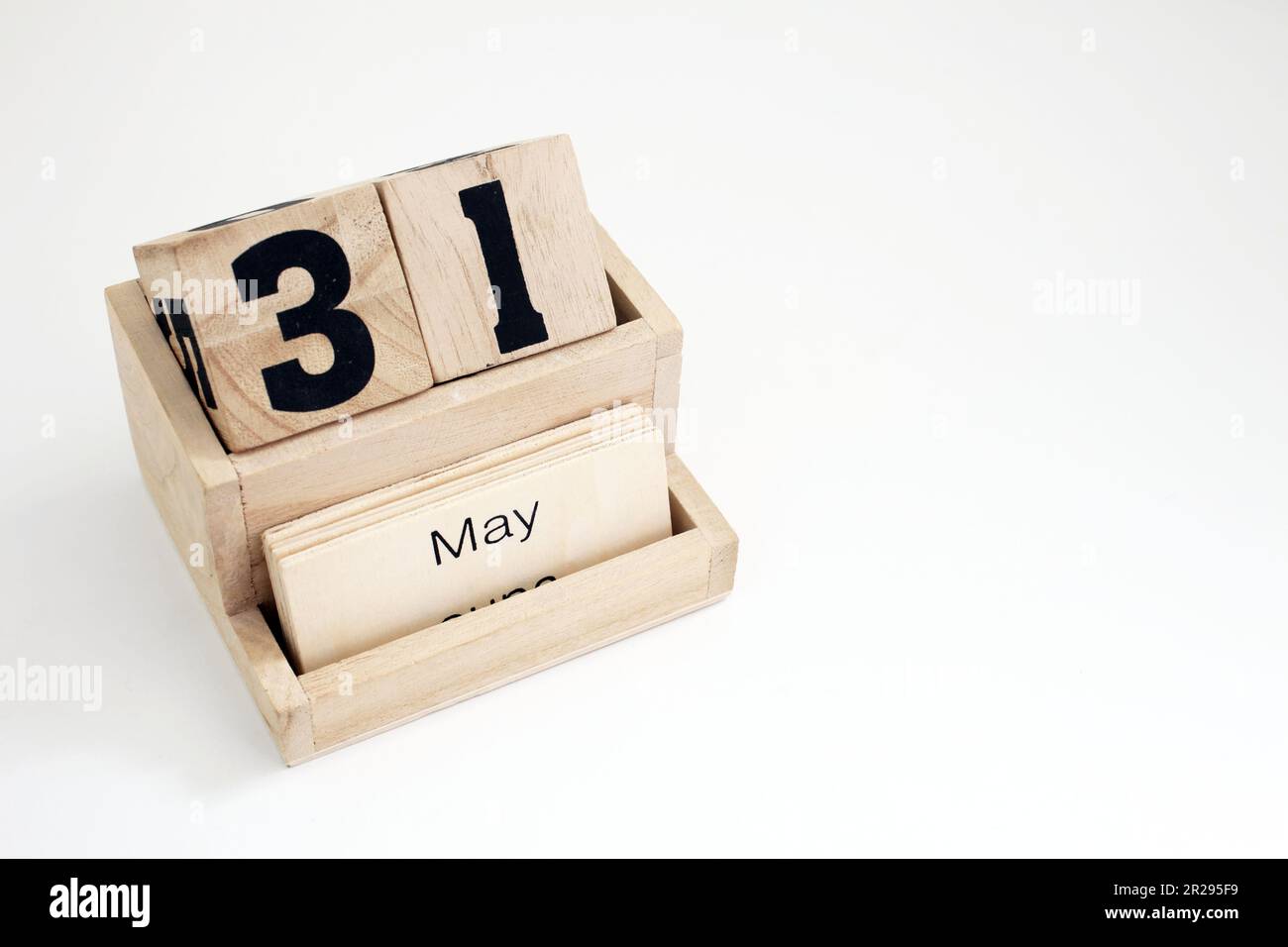 Wooden perpetual calendar showing the 31st of May Stock Photo - Alamy