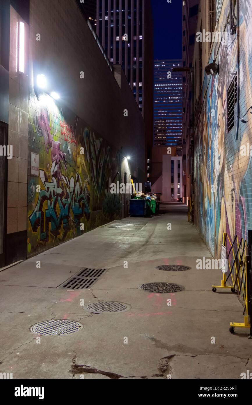 Urban city alley at night Stock Photo - Alamy