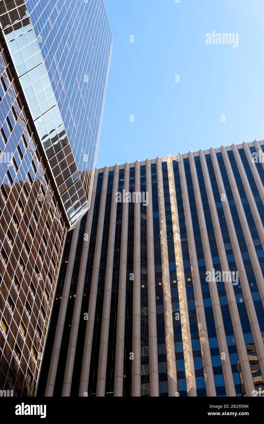 Bottom view of modern city buildings with clear sky background Stock ...