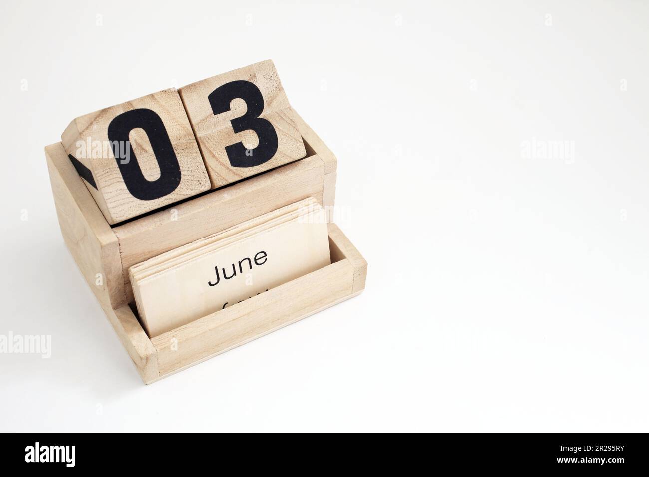 Wooden perpetual calendar showing the 3rd of June Stock Photo - Alamy