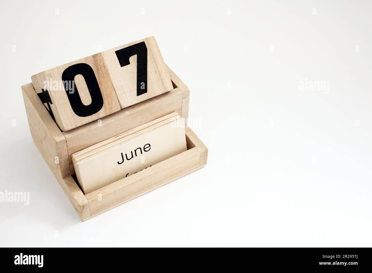 Wooden perpetual calendar showing the 7th of June Stock Photo - Alamy