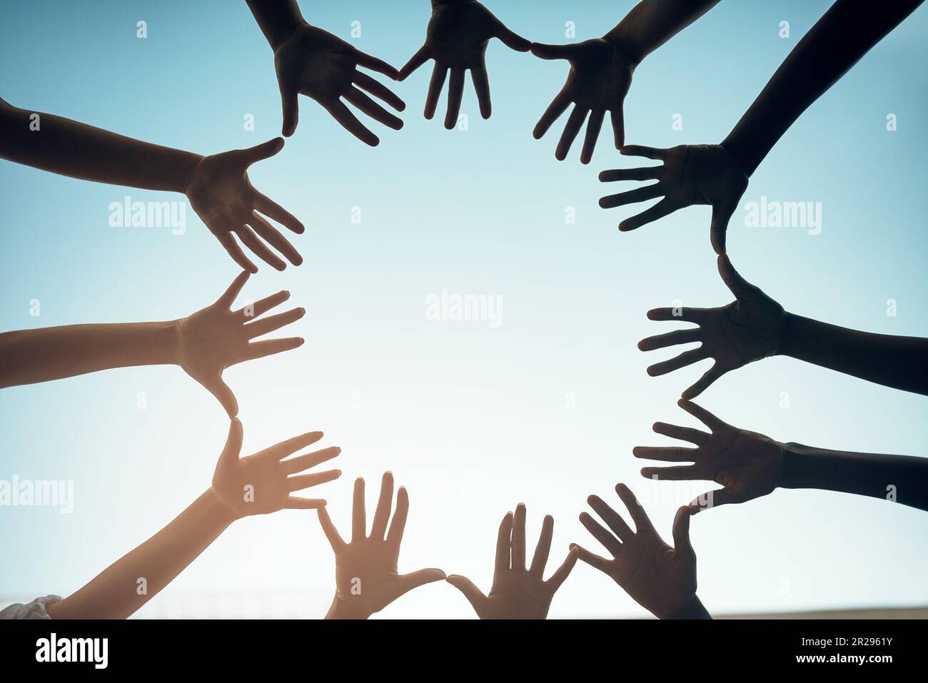 Group, circle and open hands for support and teamwork for trust in the ...