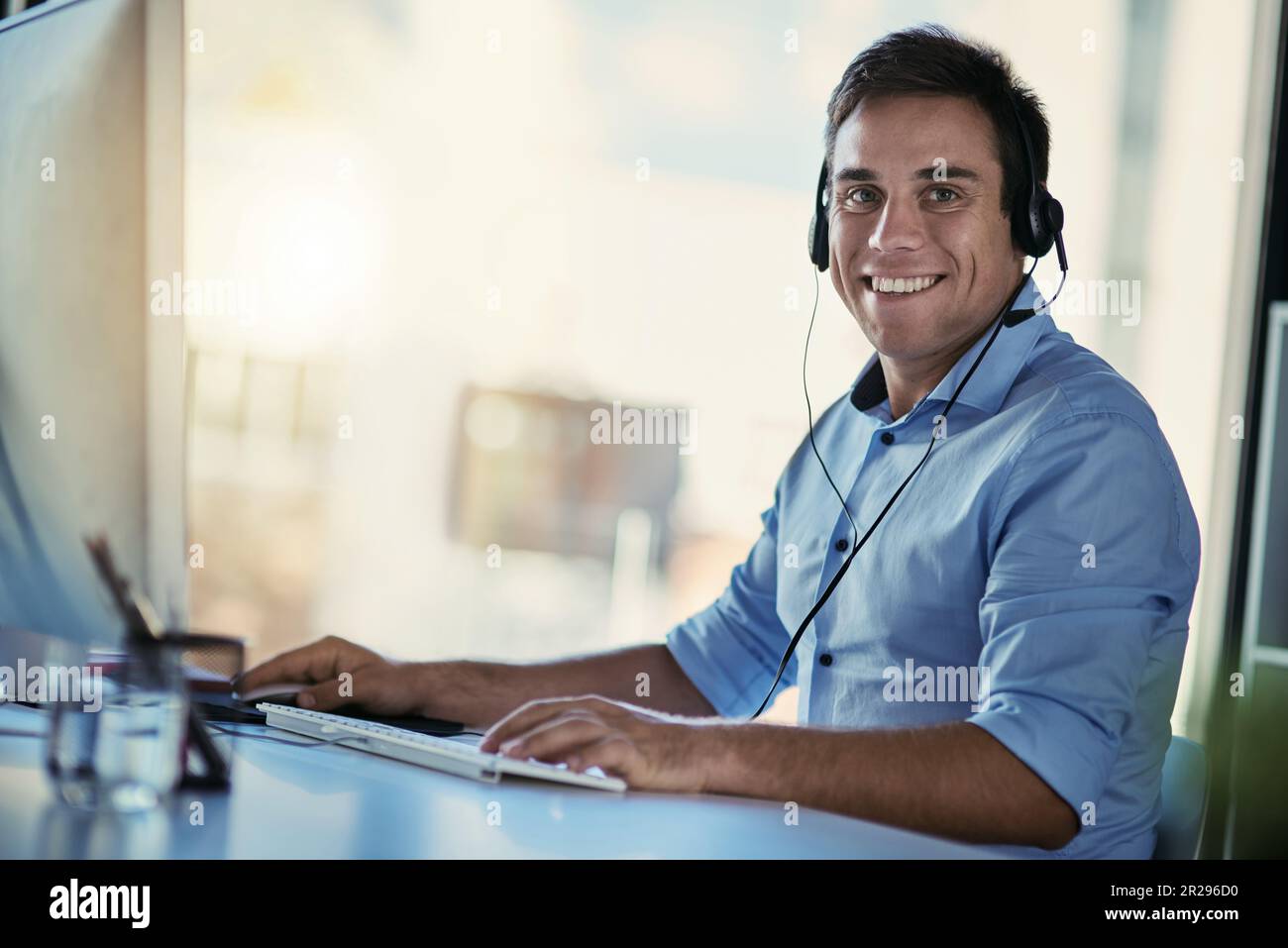 Portrait of callcenter agent, smile and man consulting with advice, crm ...