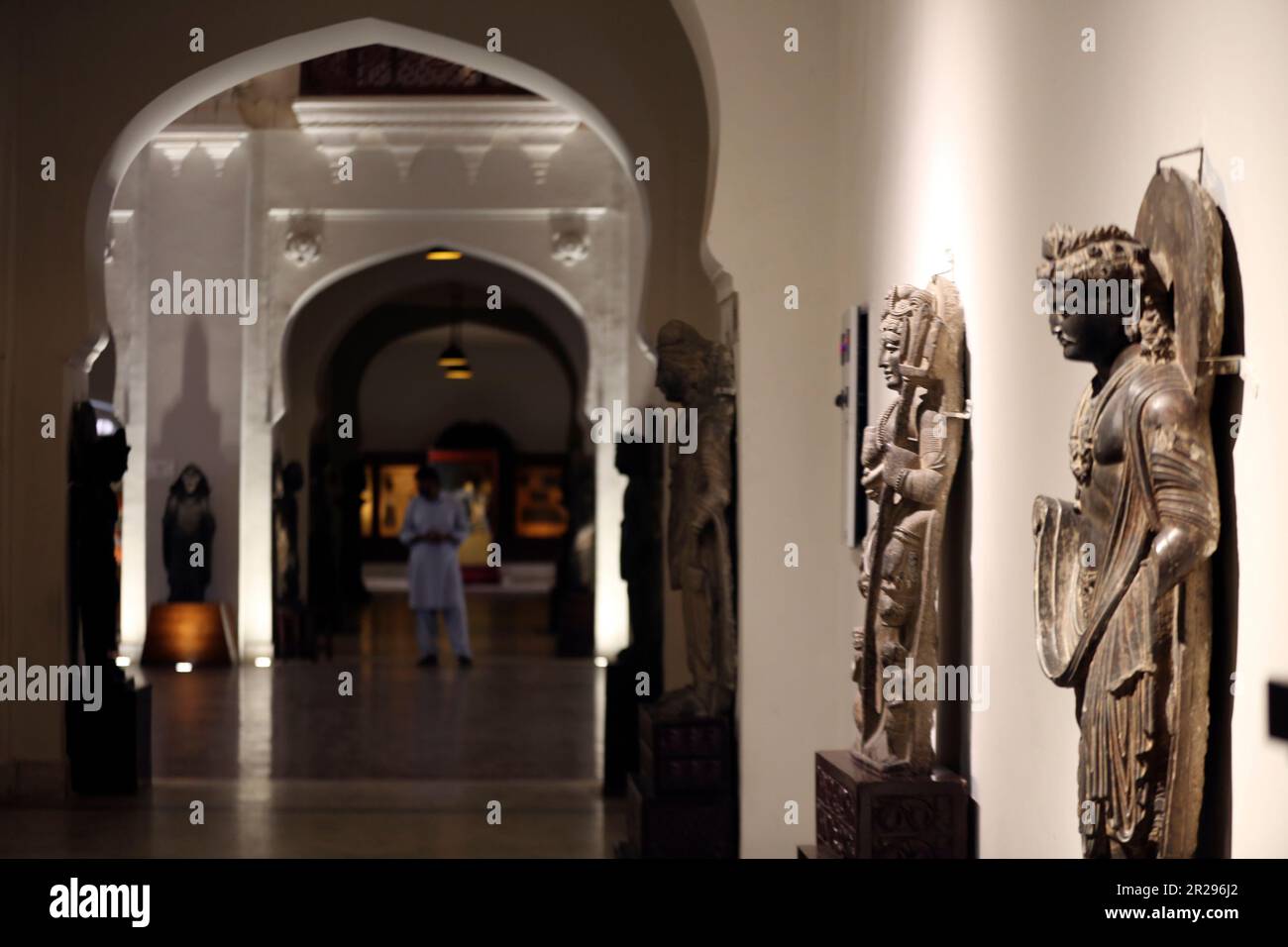 Statues are displayed in the wall at the Peshawar Museum during ...