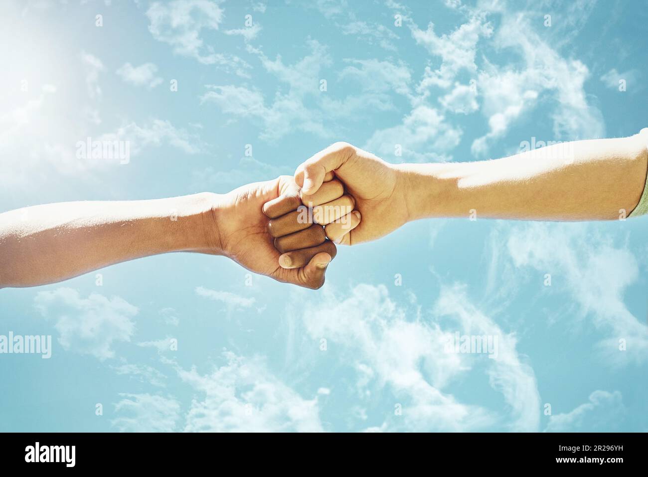 Fist bump, people and blue sky with motivation, success and teamwork ...