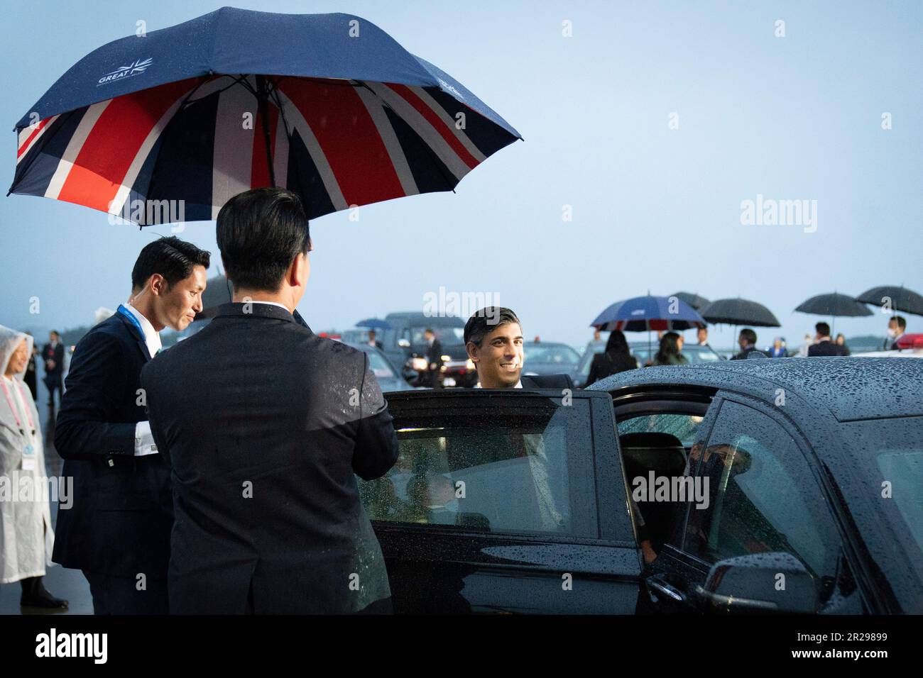 Britain's Prime Minister Rishi Sunak, center, gets into his car after ...