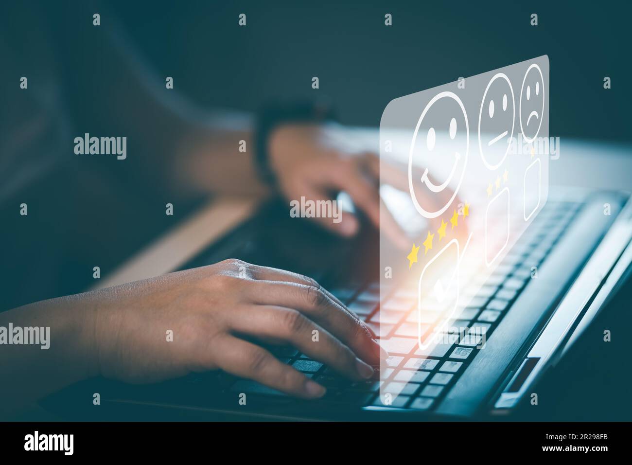 Businessman Using Laptop Computer To Input Point And Evaluation Result On Company Website