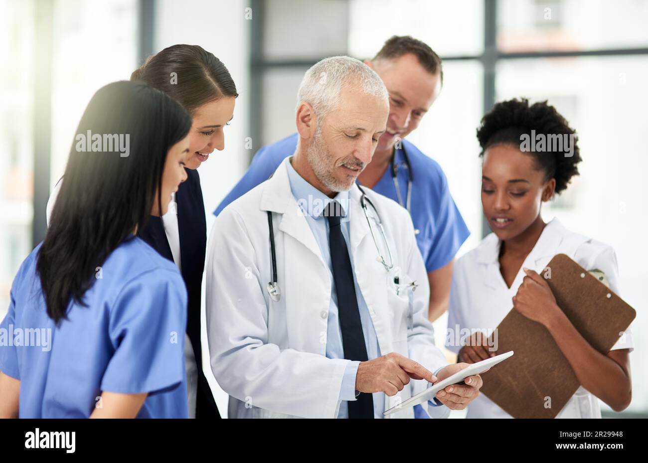 Senior doctor, tablet and coaching intern in healthcare for research ...