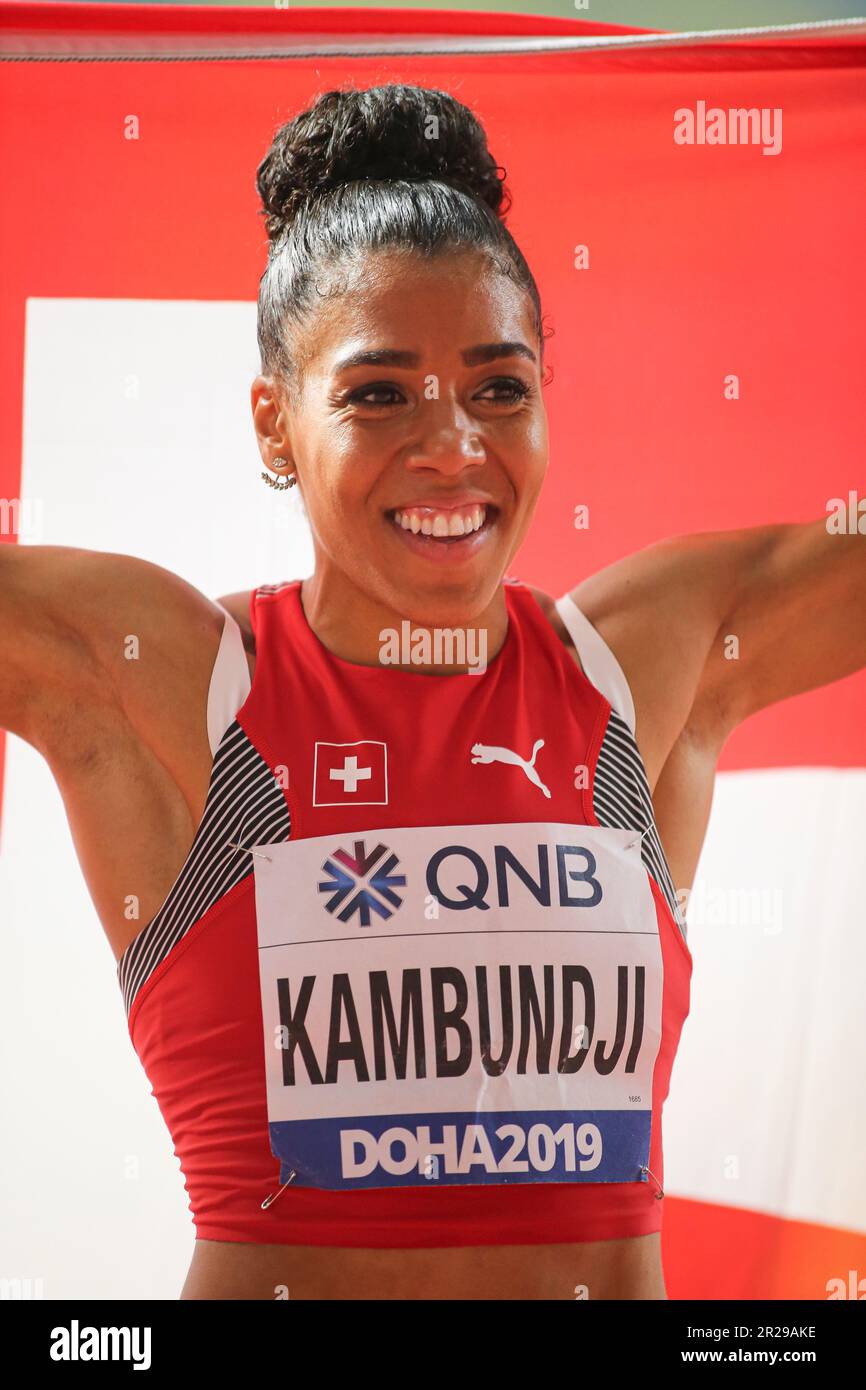 Mujinga Kambundji with his country's flag in the 200m at the 2019 World ...