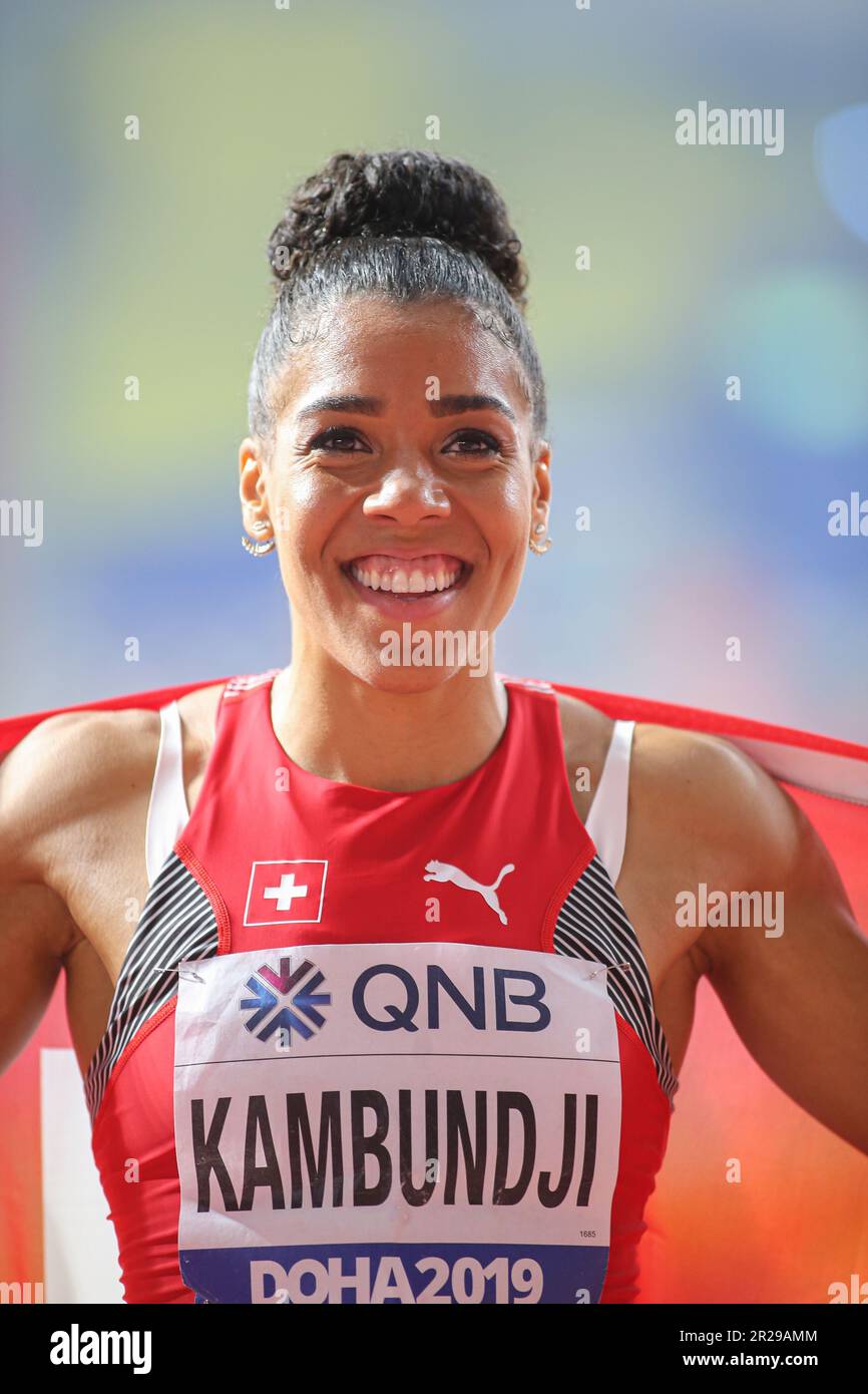 Mujinga Kambundji with his country's flag in the 200m at the 2019 World ...