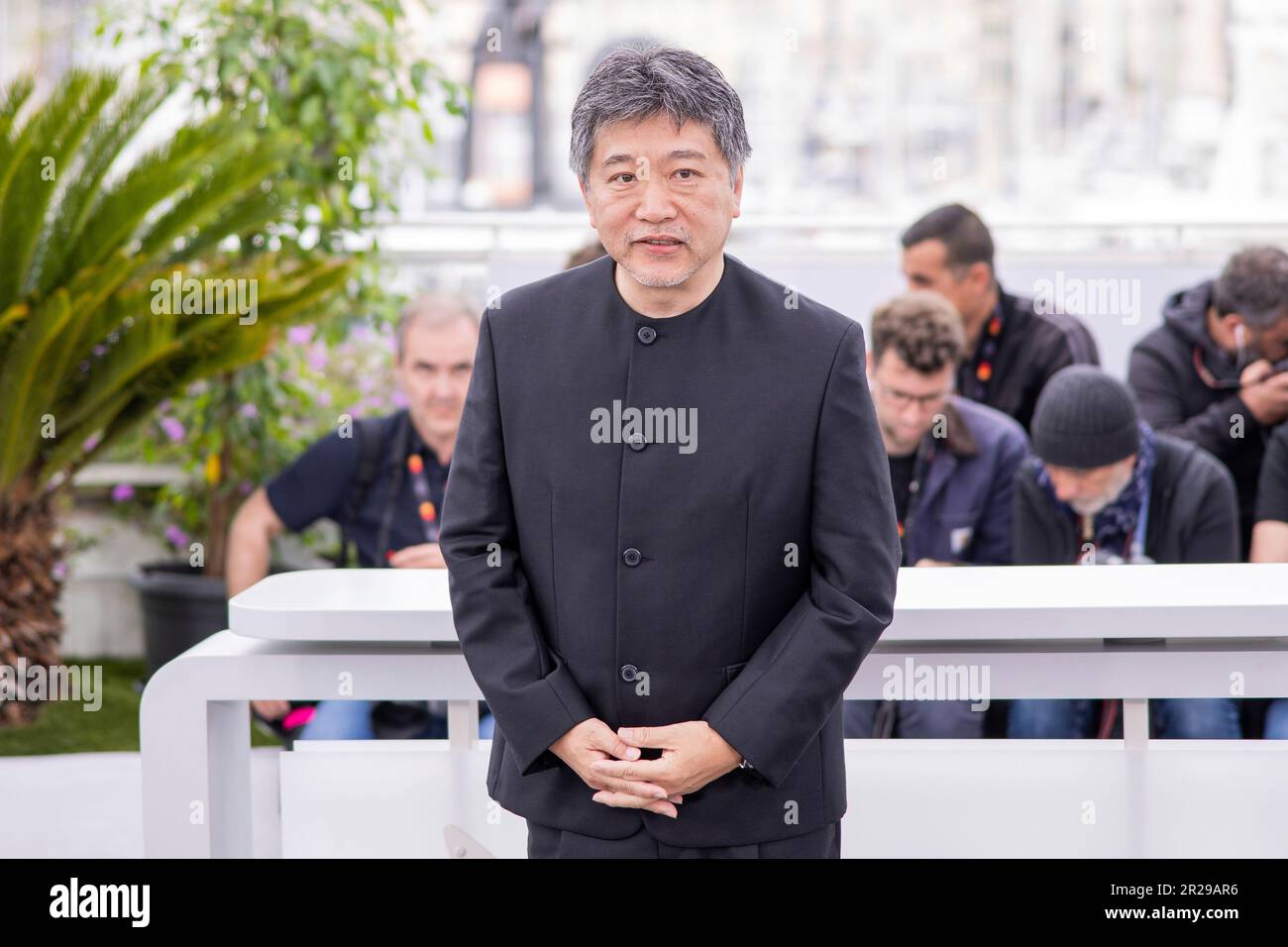 Hirokazu Koreeda poses for photographers at the photo call for the film ...