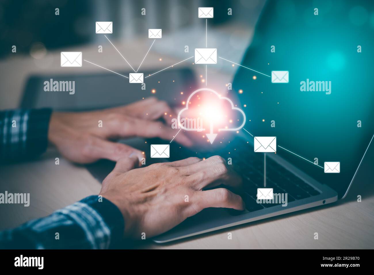 Hand using laptop with cloud computing and Email online storage concept ...