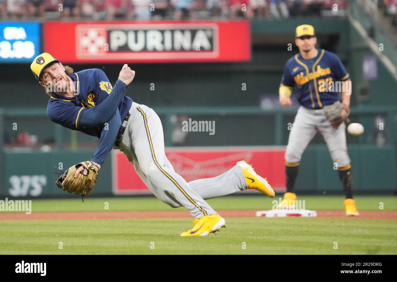 Milwaukee Brewers Brice Turang makes a late throw to first base as he tries to get St. Louis ...