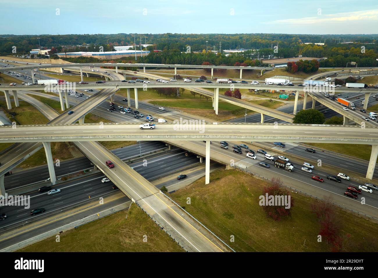 Aerial view of american freeway intersection with fast moving cars and ...