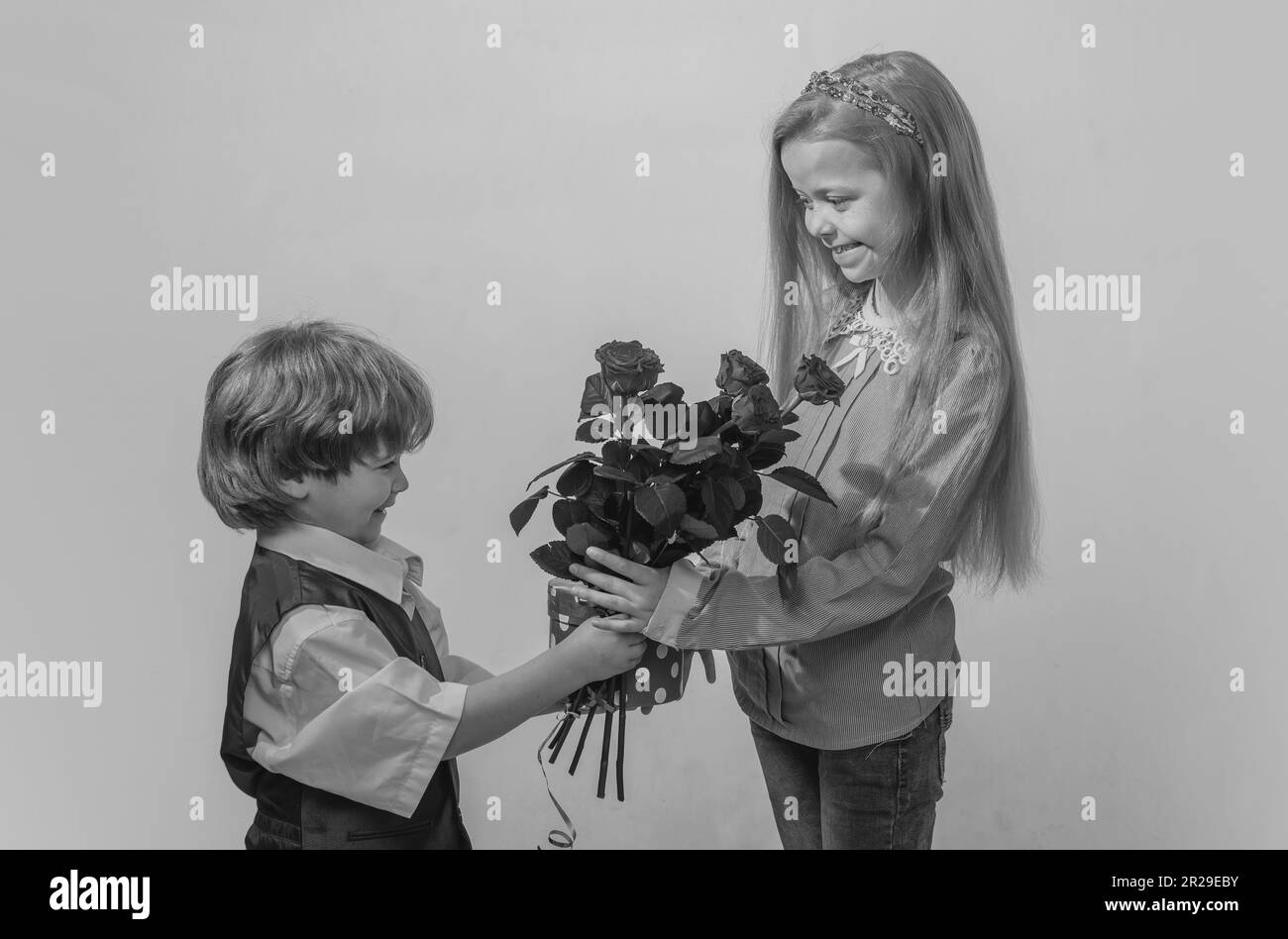 Little Boy with a rose for his teen girlfriend, romantic children ...