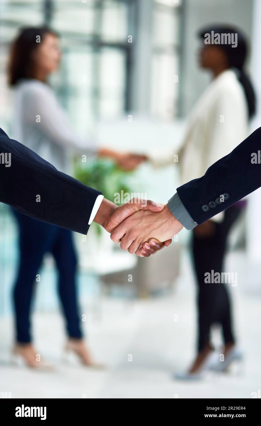 Handshake, thank you and business people with welcome sign for hiring ...