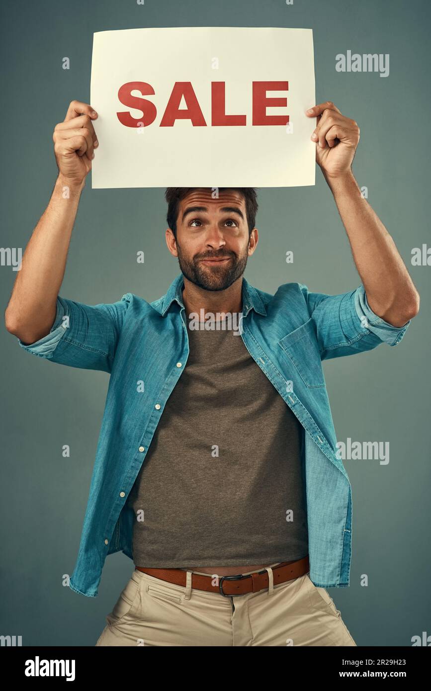 Man, hands and sale on billboard for advertising, marketing or branding ...