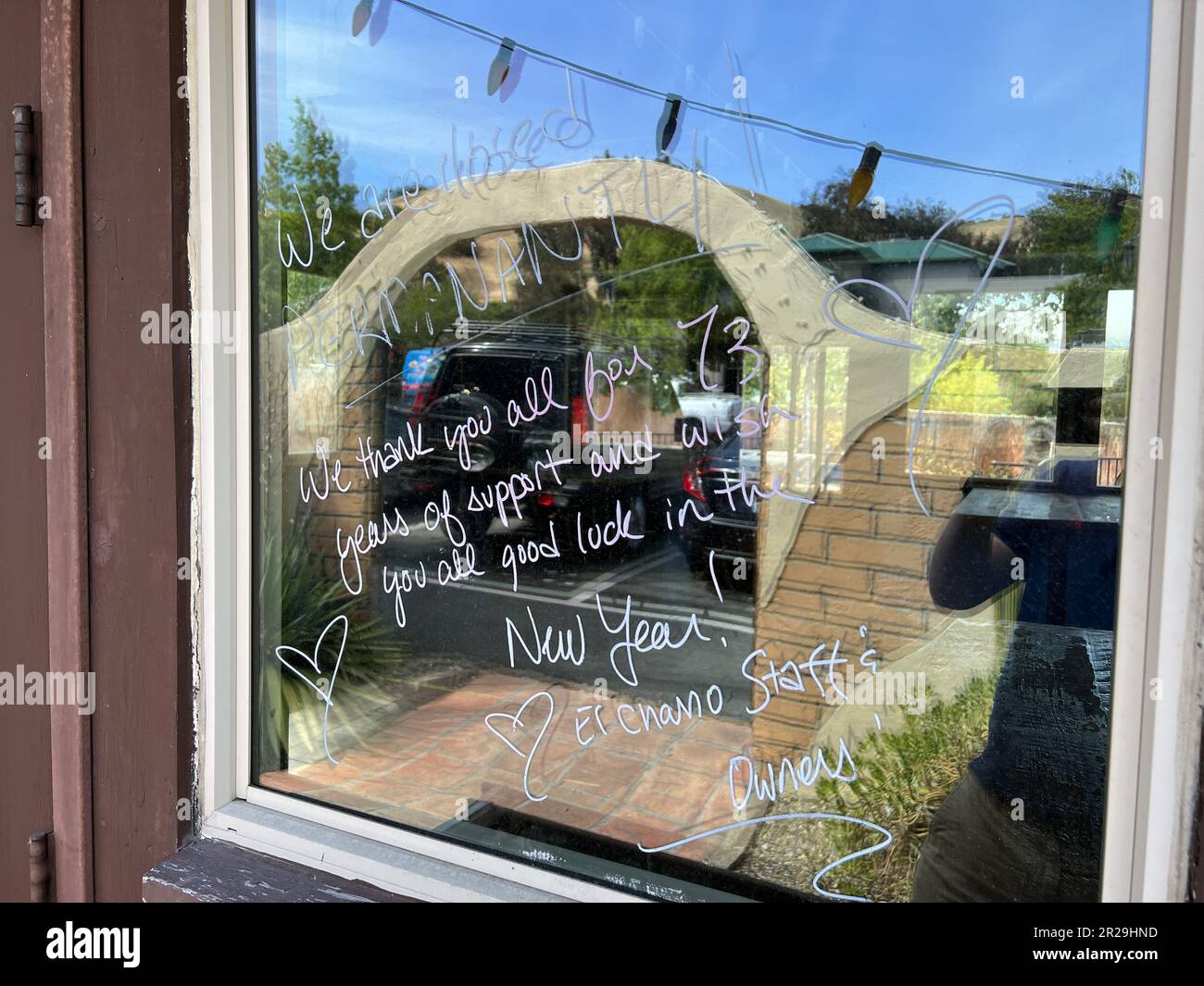 Handwritten message announcing the permanent closure of El Charro ...