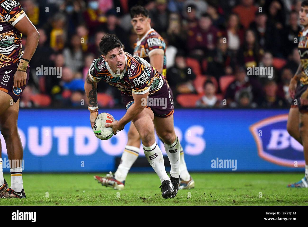 Cory Paix of the Broncos passes the ball during the NRL Round 12 match ...