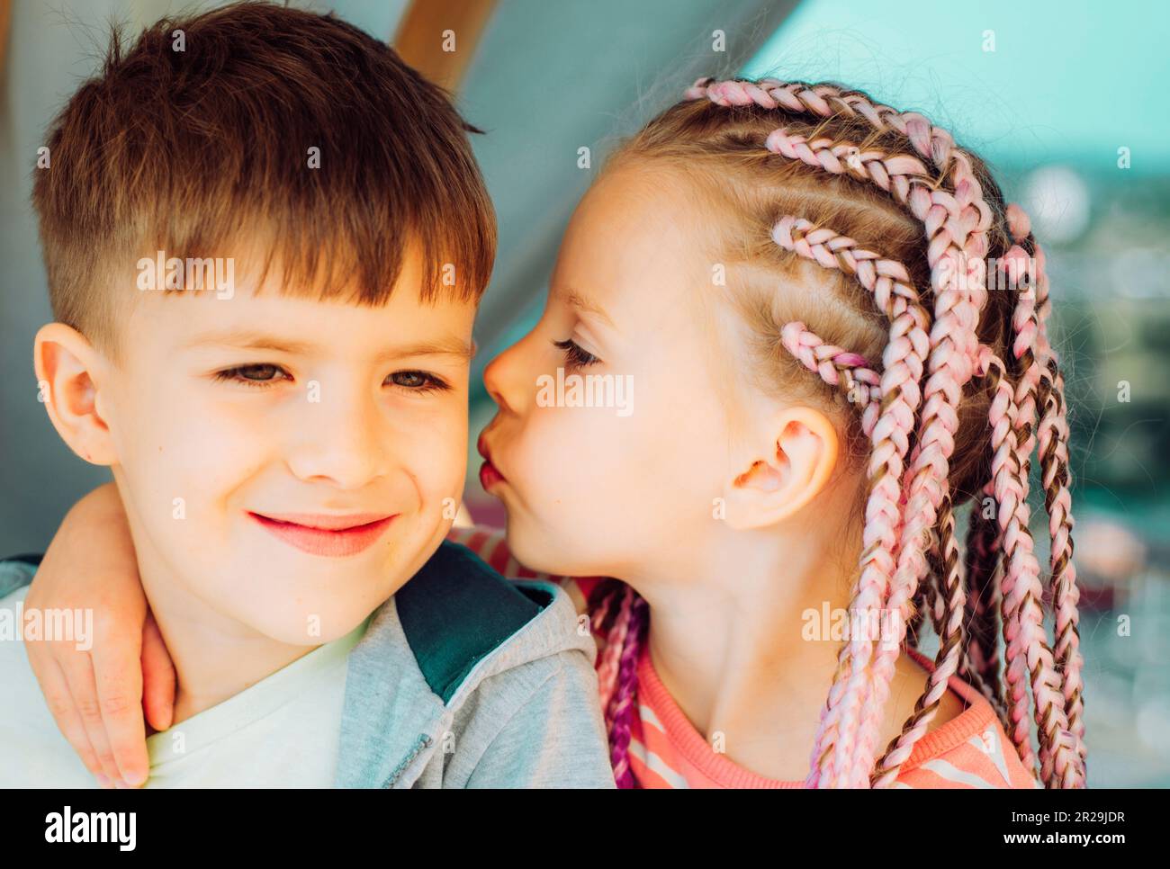 Sweet romantic. Kids little couple. Cute love. Little girl kissing boy. Children relationships ...