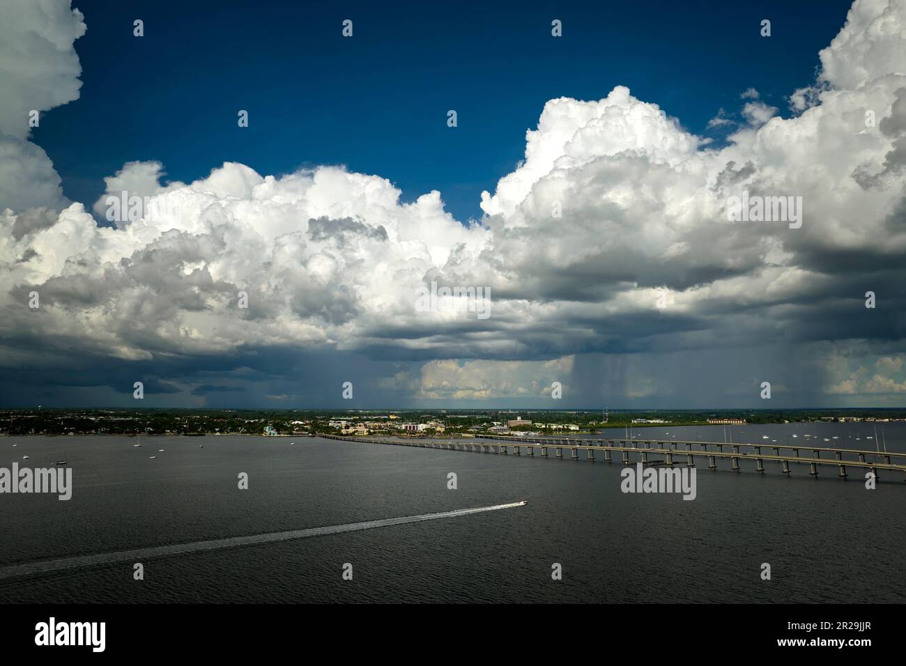 Heavy thunderstorm approaching traffic bridge connecting Punta Gorda ...